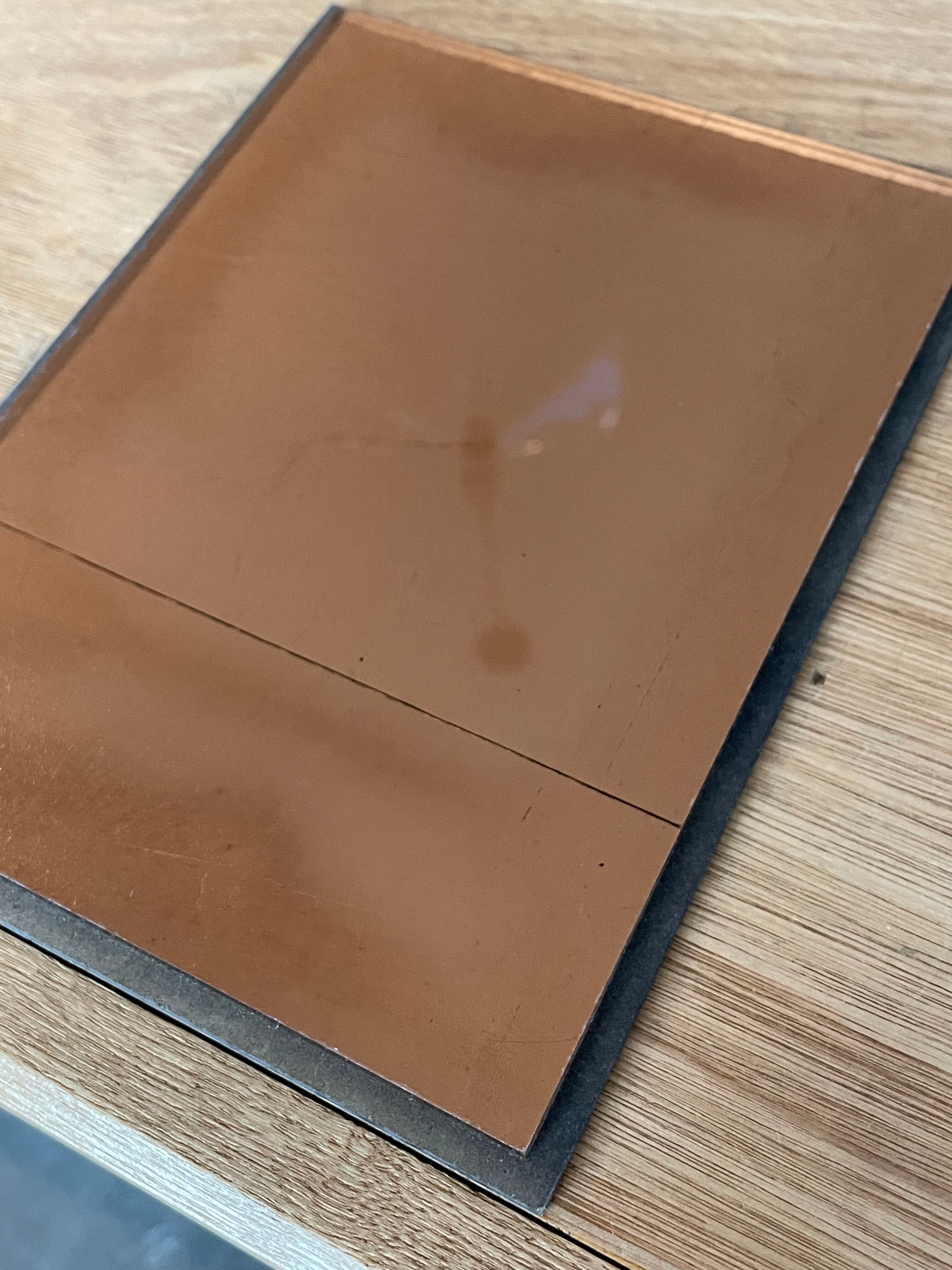 Morwellham on Bronze Tinted Glass Sample